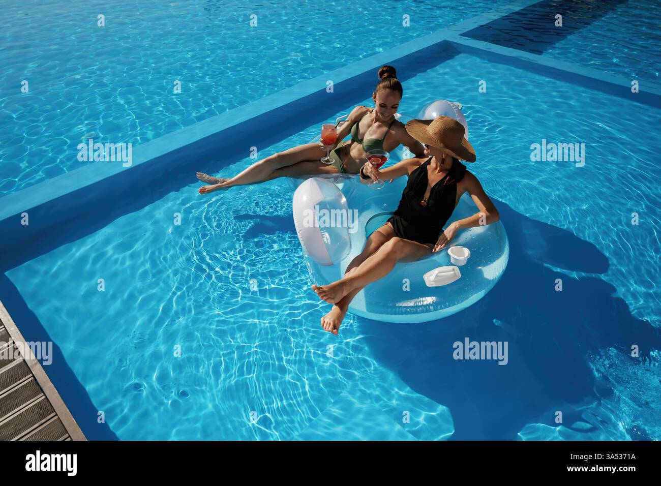 Two beautiful women in bikini hi-res stock photography and images - Alamy