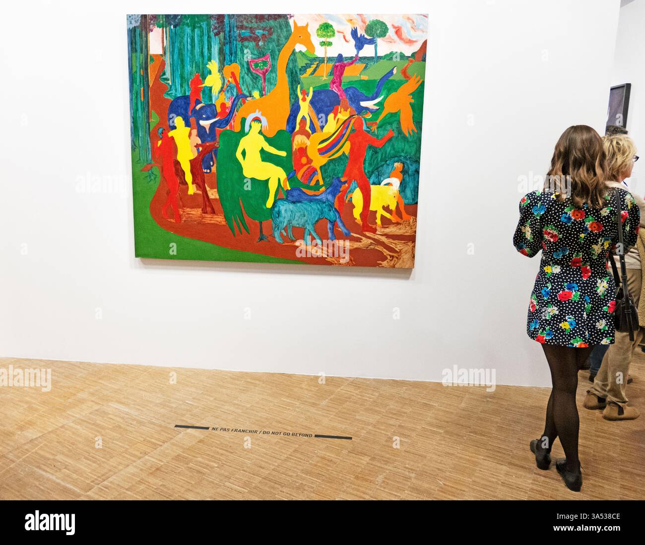 Women seen in front of a painting by Bob Thompson, born 26 June 1937 in ...