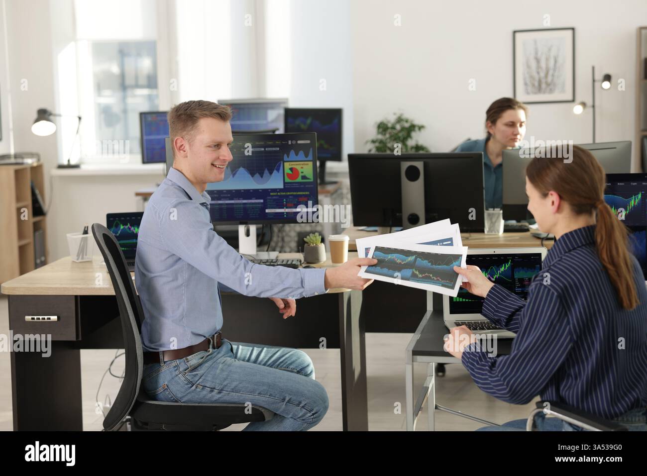 Stock exchange. Business team working together in office Stock Photo ...