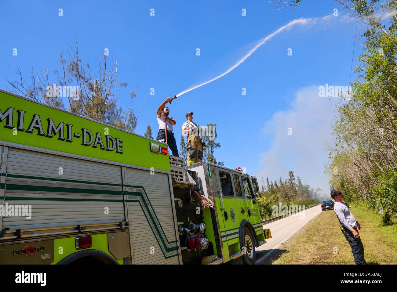 March 20, 2025, Florida City, Fl, USA: Miami Dade Fire Fighters spray ...