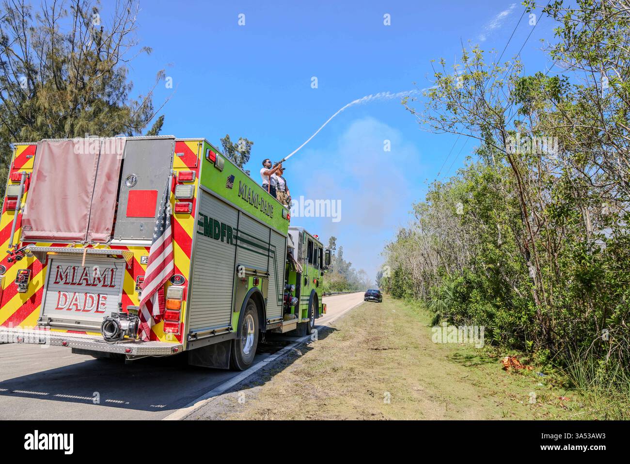 March 20, 2025, Florida City, Fl, USA: Miami Dade Fire Fighters spray ...