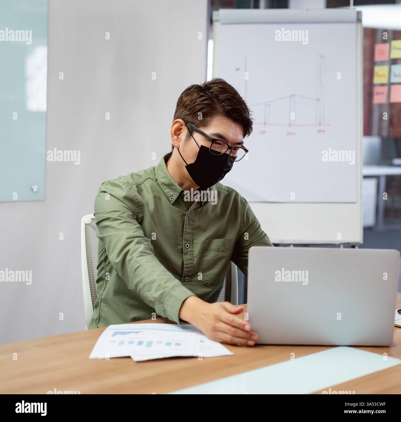 Analyzing charts man in hi-res stock photography and images - Alamy