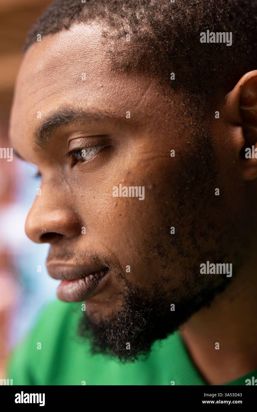 Pensive moody person with focused expression thinking, side profile ...