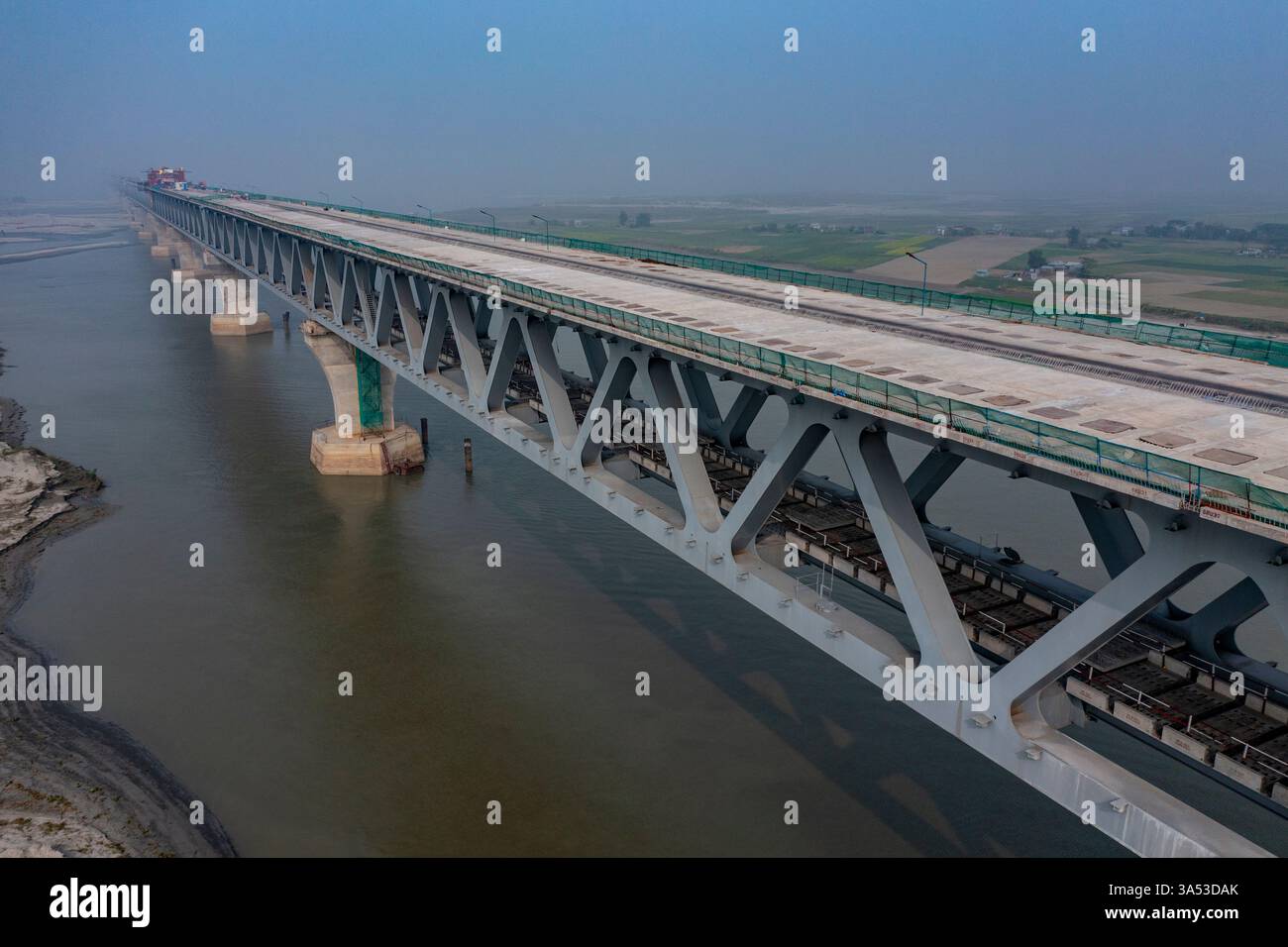 An aerial view of the under-construction Padma Bridge, connecting both ...