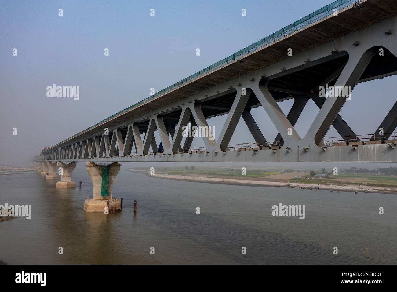 An aerial view of the under-construction Padma Bridge, connecting both ...
