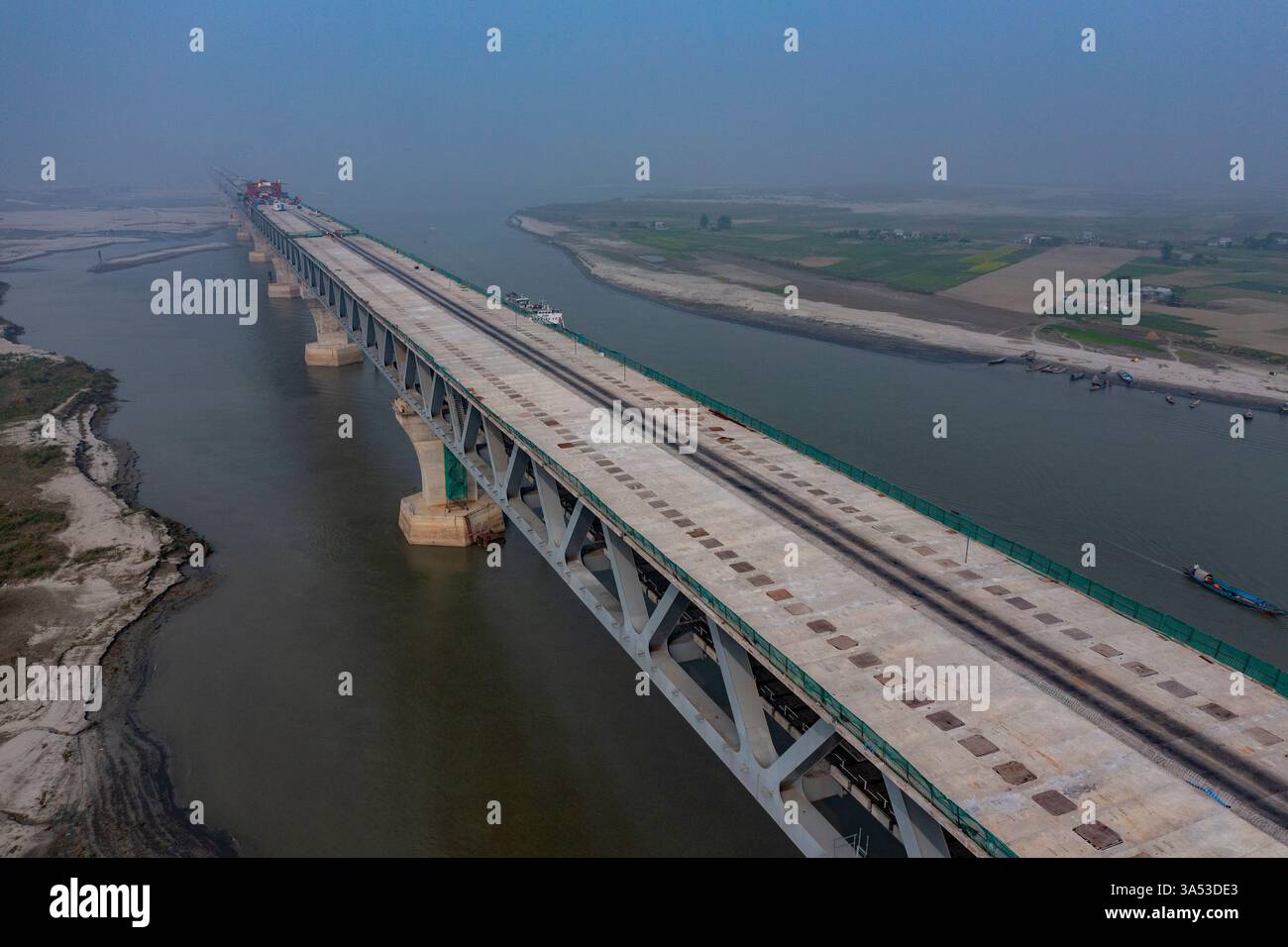 An aerial view of the under-construction Padma Bridge, connecting both ...