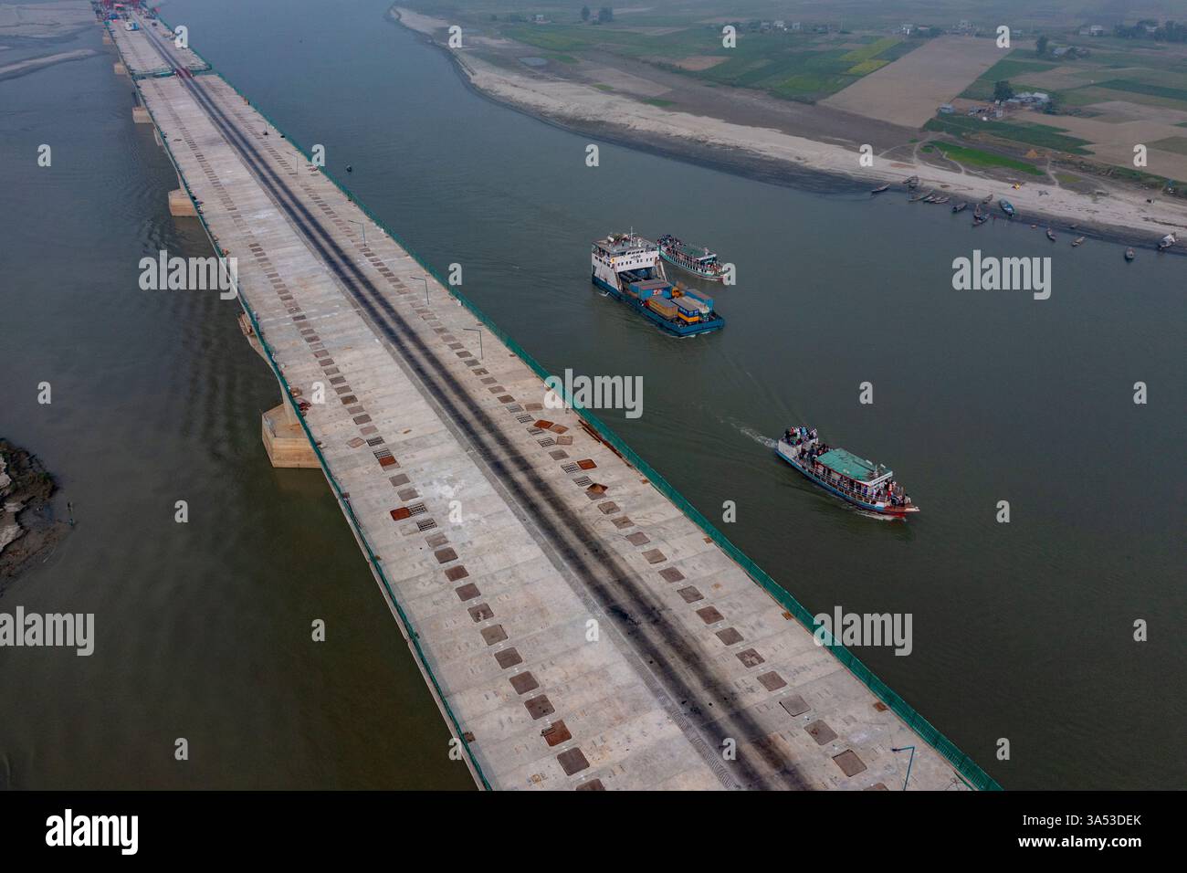 An aerial view of the under-construction Padma Bridge, connecting both ...