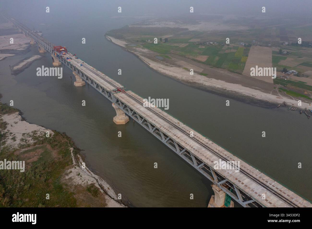 An aerial view of the under-construction Padma Bridge, connecting both ...
