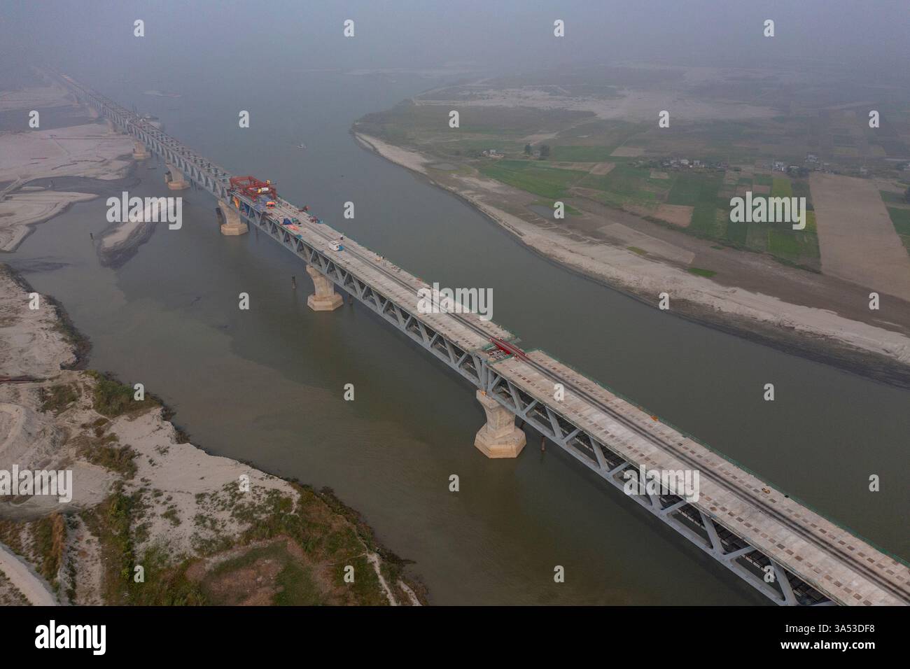 An aerial view of the under-construction Padma Bridge, connecting both ...