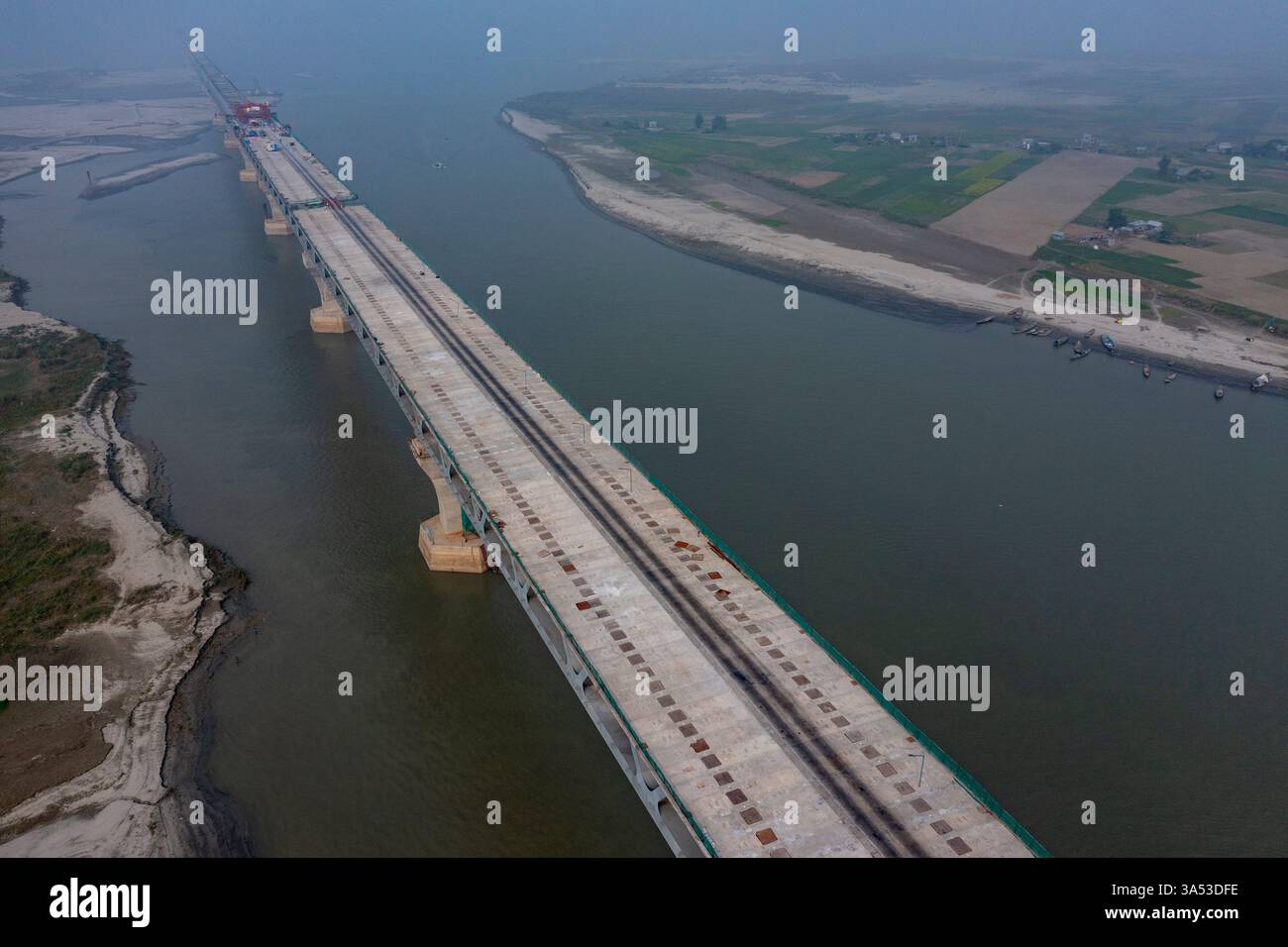 An aerial view of the under-construction Padma Bridge, connecting both ...