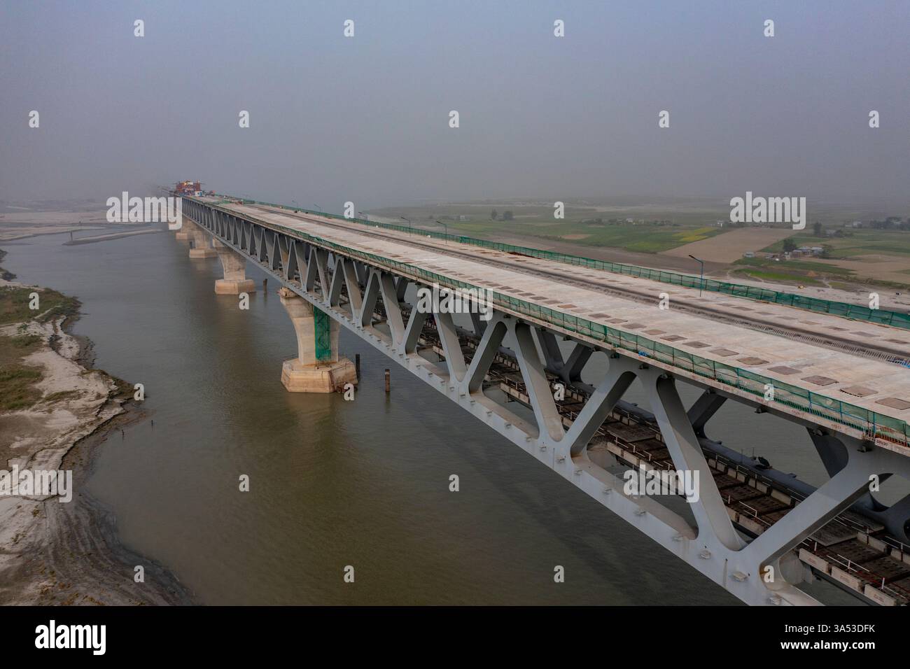 An aerial view of the under-construction Padma Bridge, connecting both ...
