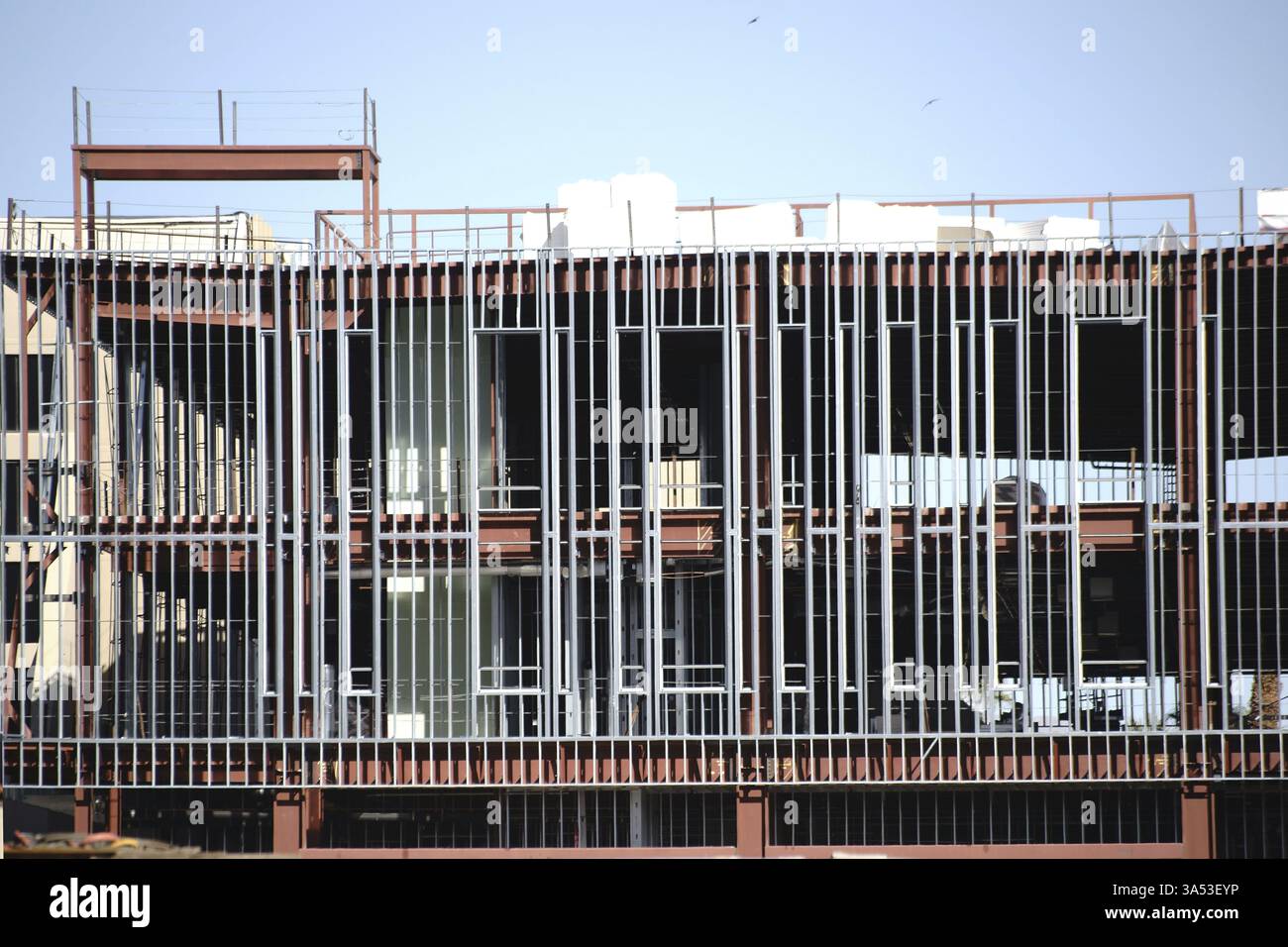 The new construction of a multi-storey car park with parking levels and ...