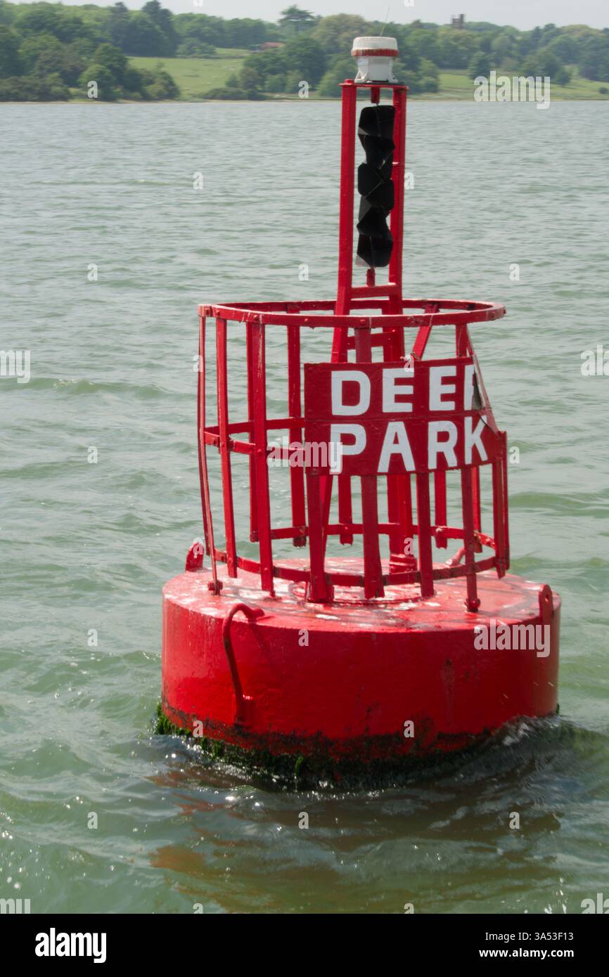 Red navigation channel marker buoy in River Orwell, Suffolk Stock Photo ...