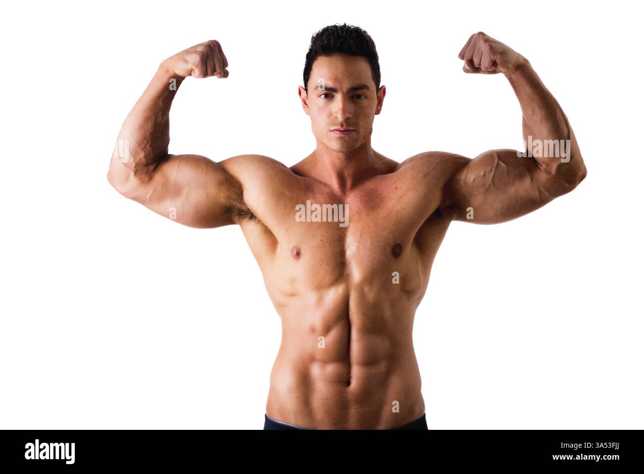 Handsome bodybuilder doing classic double biceps pose, looking at ...