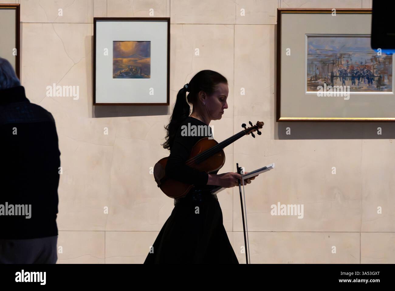 A violinist of Russian conductor Yuri Bashmet's Chamber ensemble ...