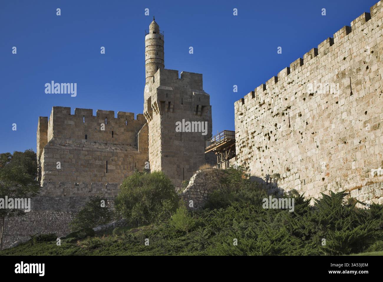 The ancient walls surrounding Old city in Jerusalem and the Tower of ...