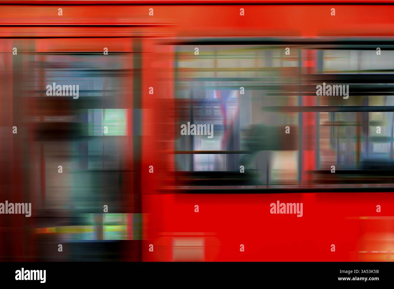 The blurred exterior body of an underground railway in London with two ...