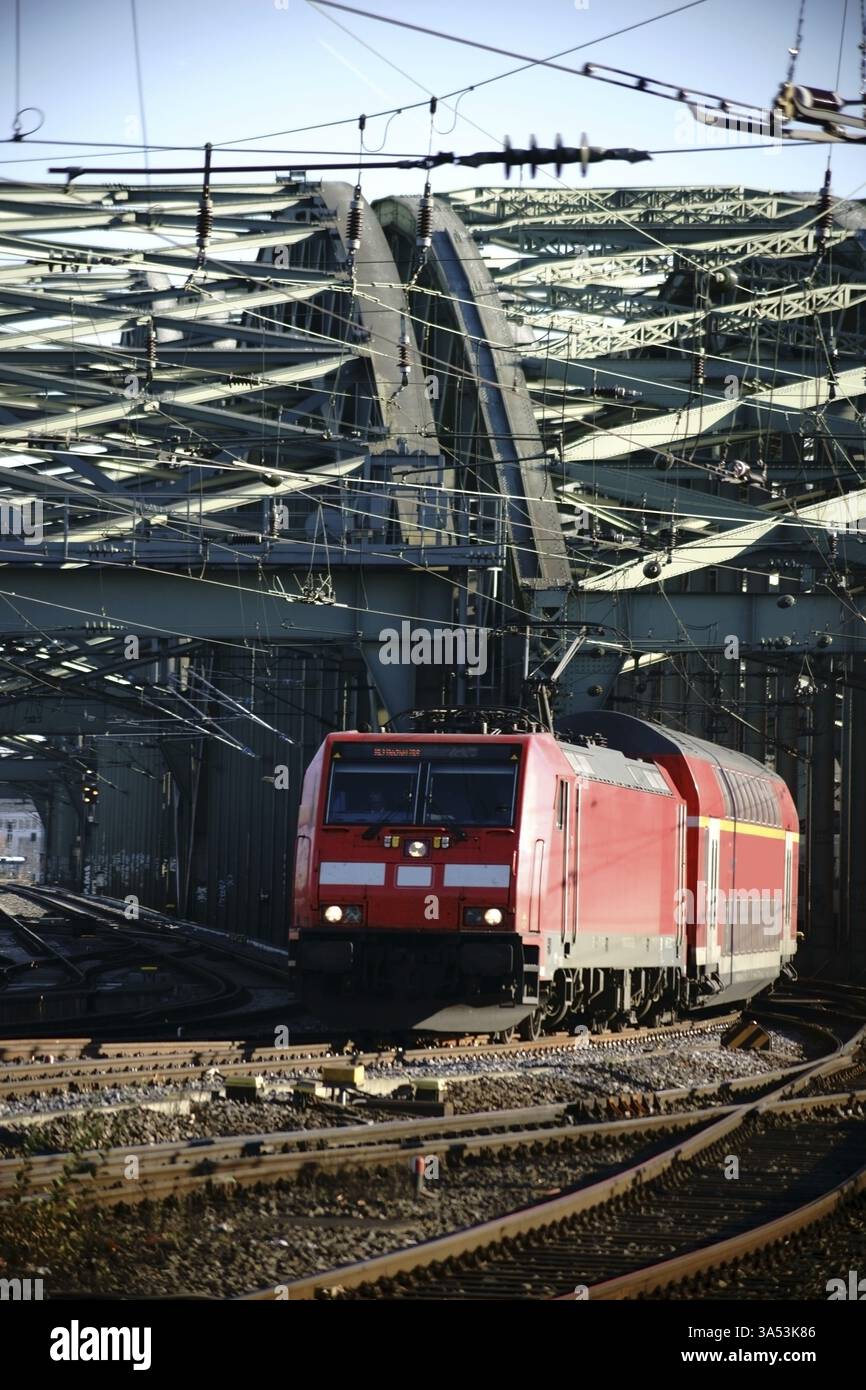 A Deutsche Bahn regional train on a track of the Hohenzollern Bridge in ...