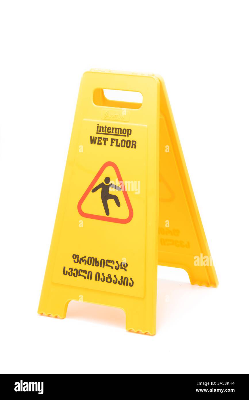 Cautionary Wet Floor Sign: Bright Yellow Safety Marker to Prevent Slips ...