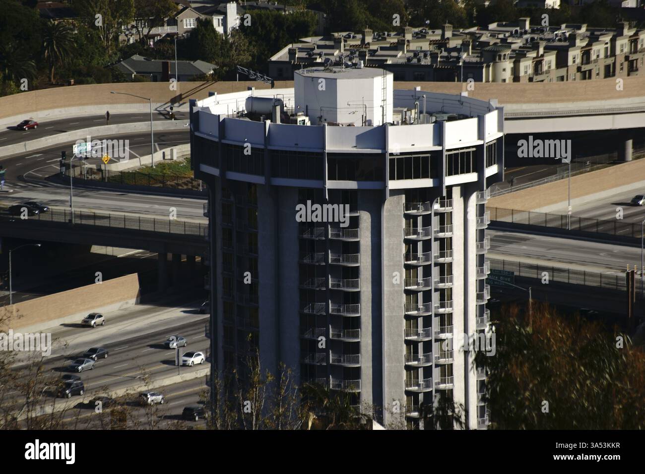 Infrastructure with a round residential building and a transport hub ...