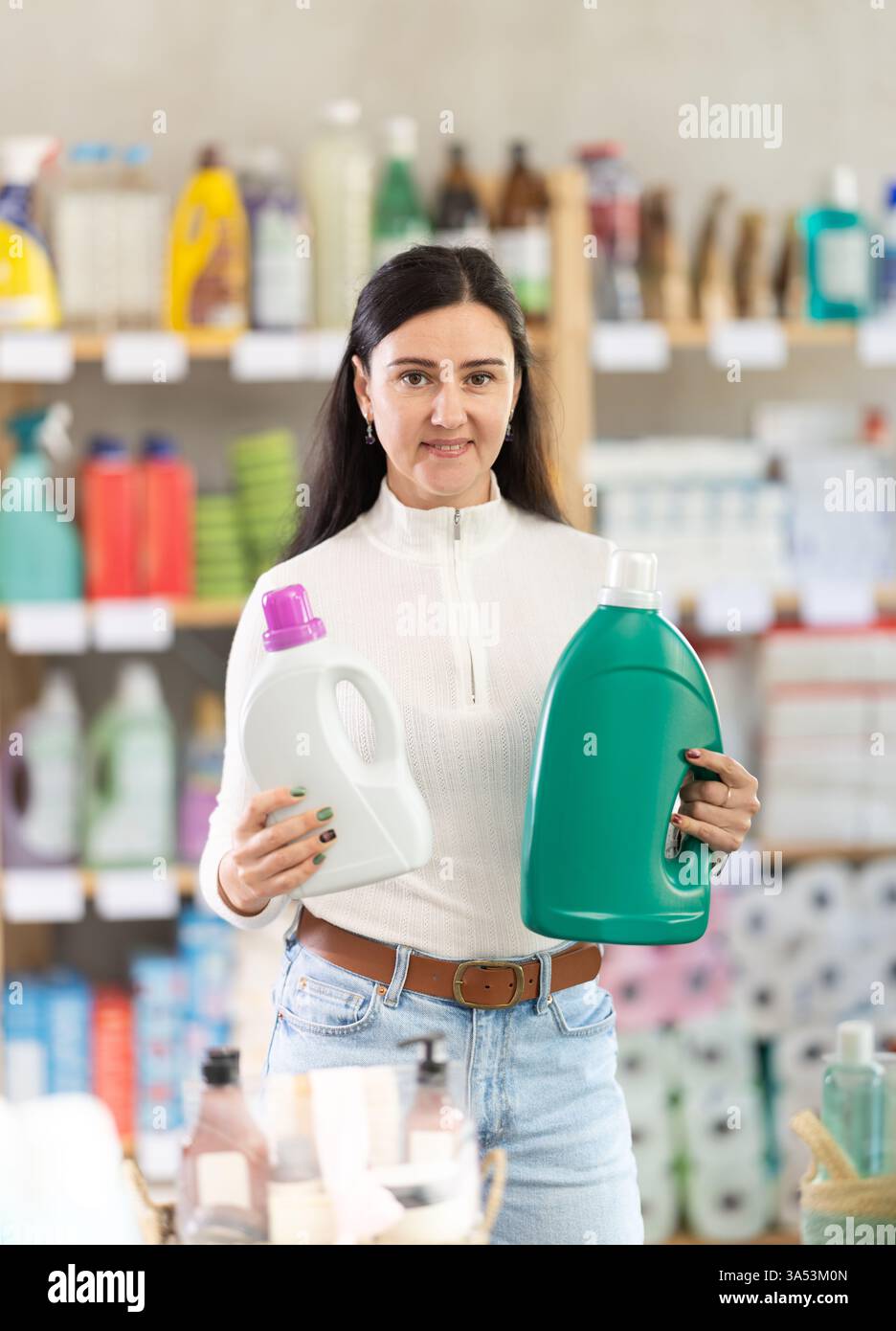 customer in a Spanish supermarket chooses detergent Stock Photo - Alamy