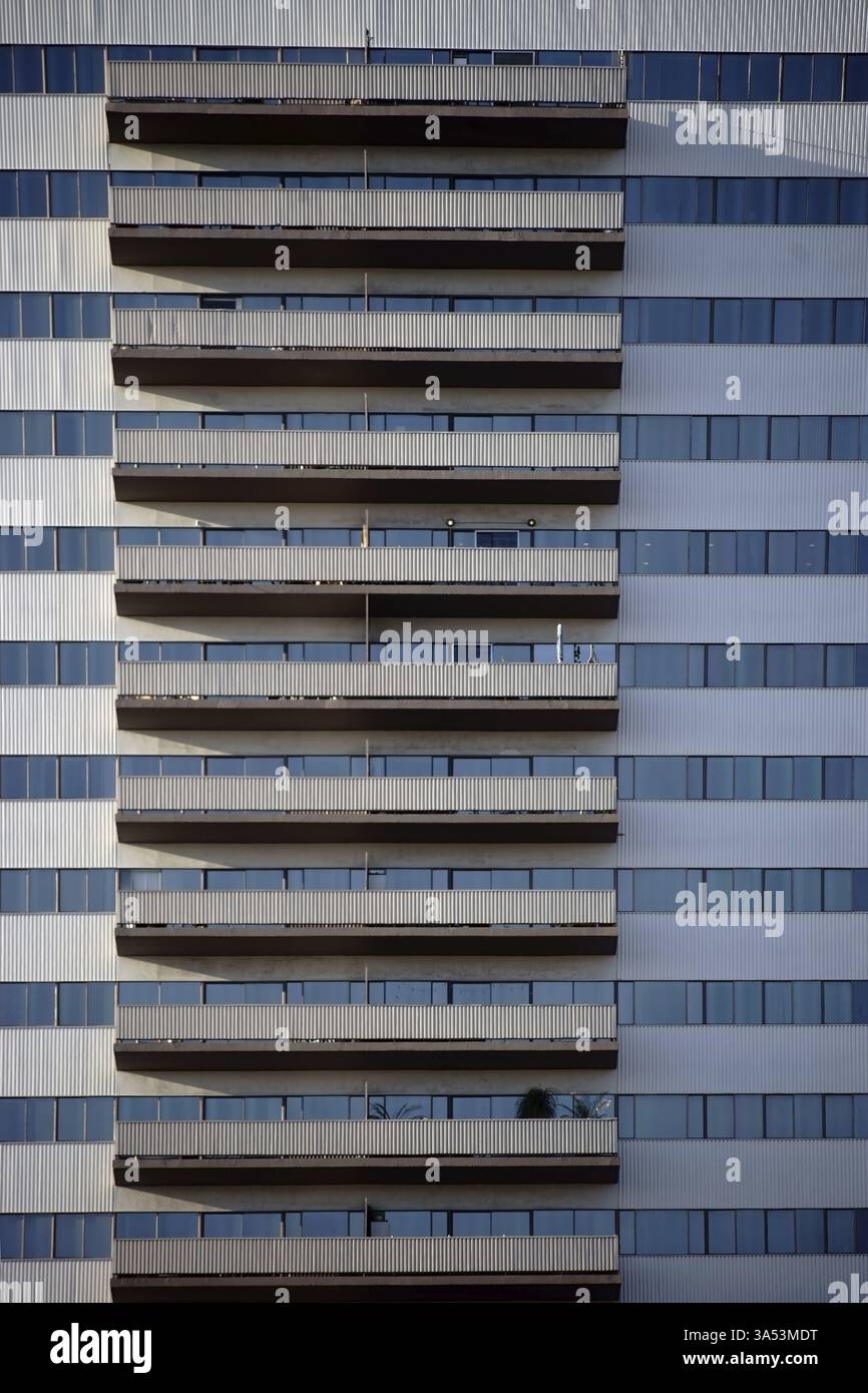 The high-rise facade of a residential and commercial building with ...