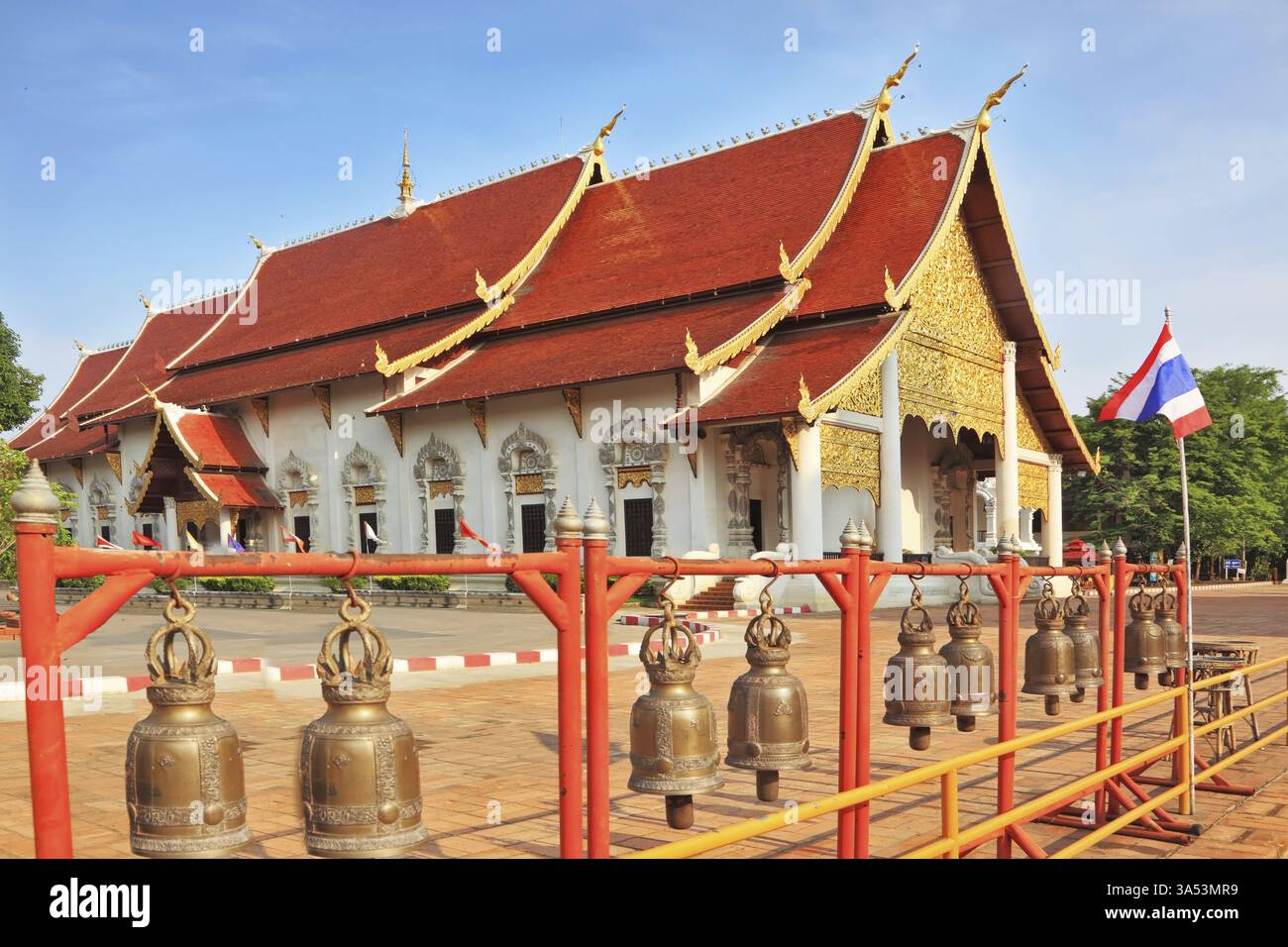 Gold-plated entrance to a Buddhist temple in northern Thailand. The ...