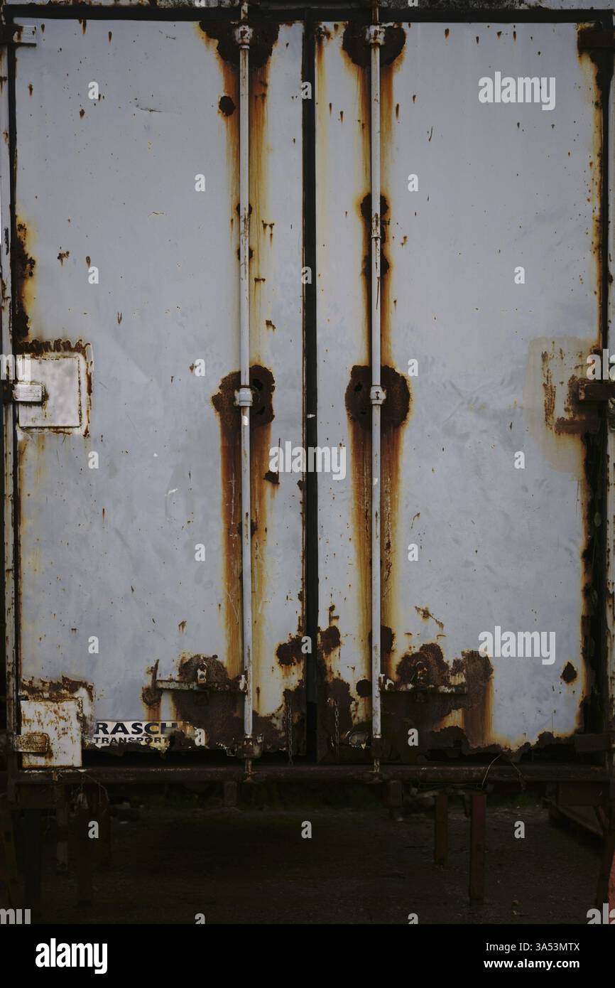 The front view of an old rusty cargo container and lorry trailer Stock ...