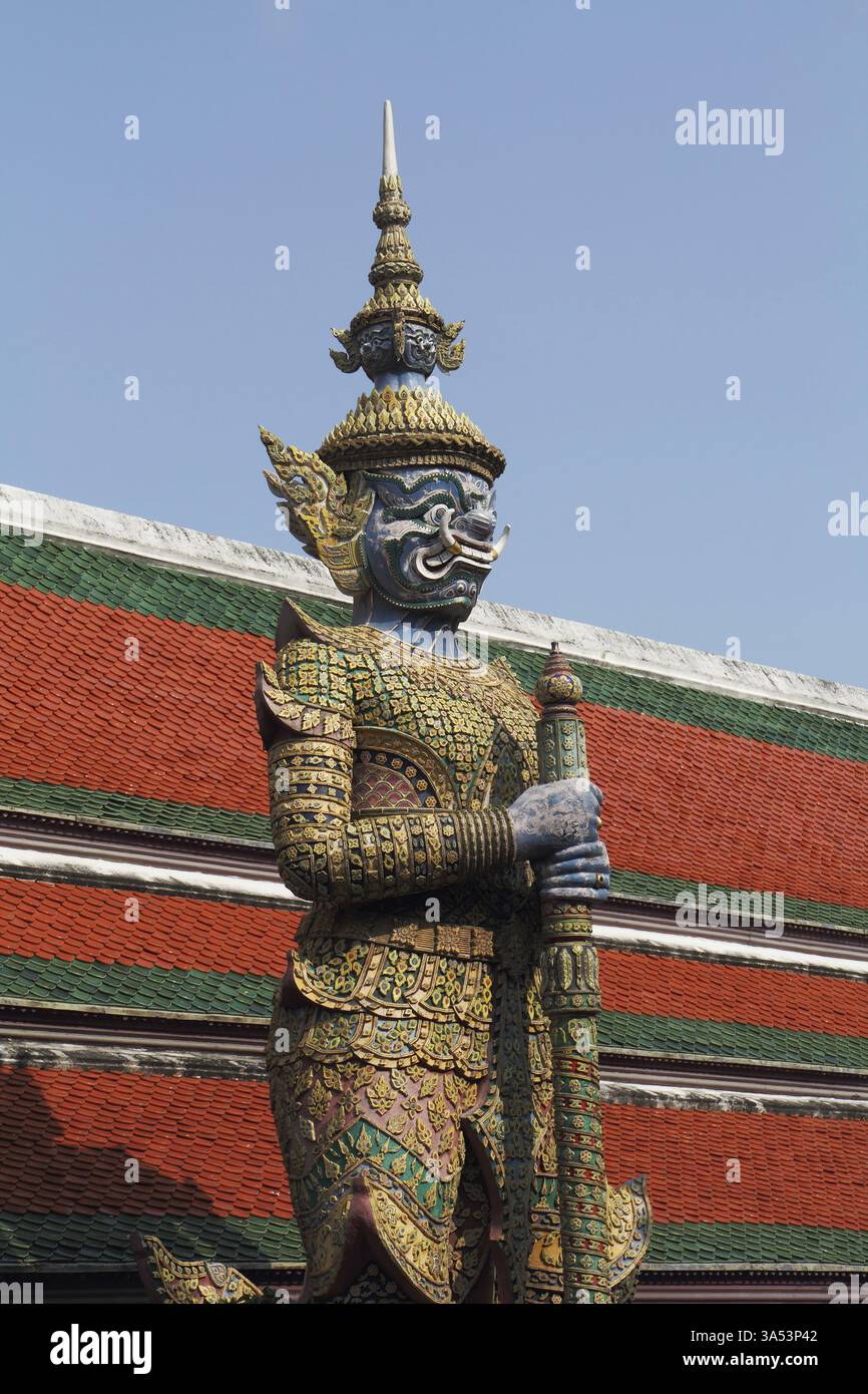 Log huge statues the genie and the demon. Red-green tile roofs and ...