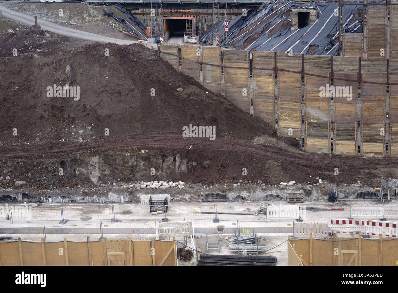 The side view of an excavated and stabilised construction pit of a ...