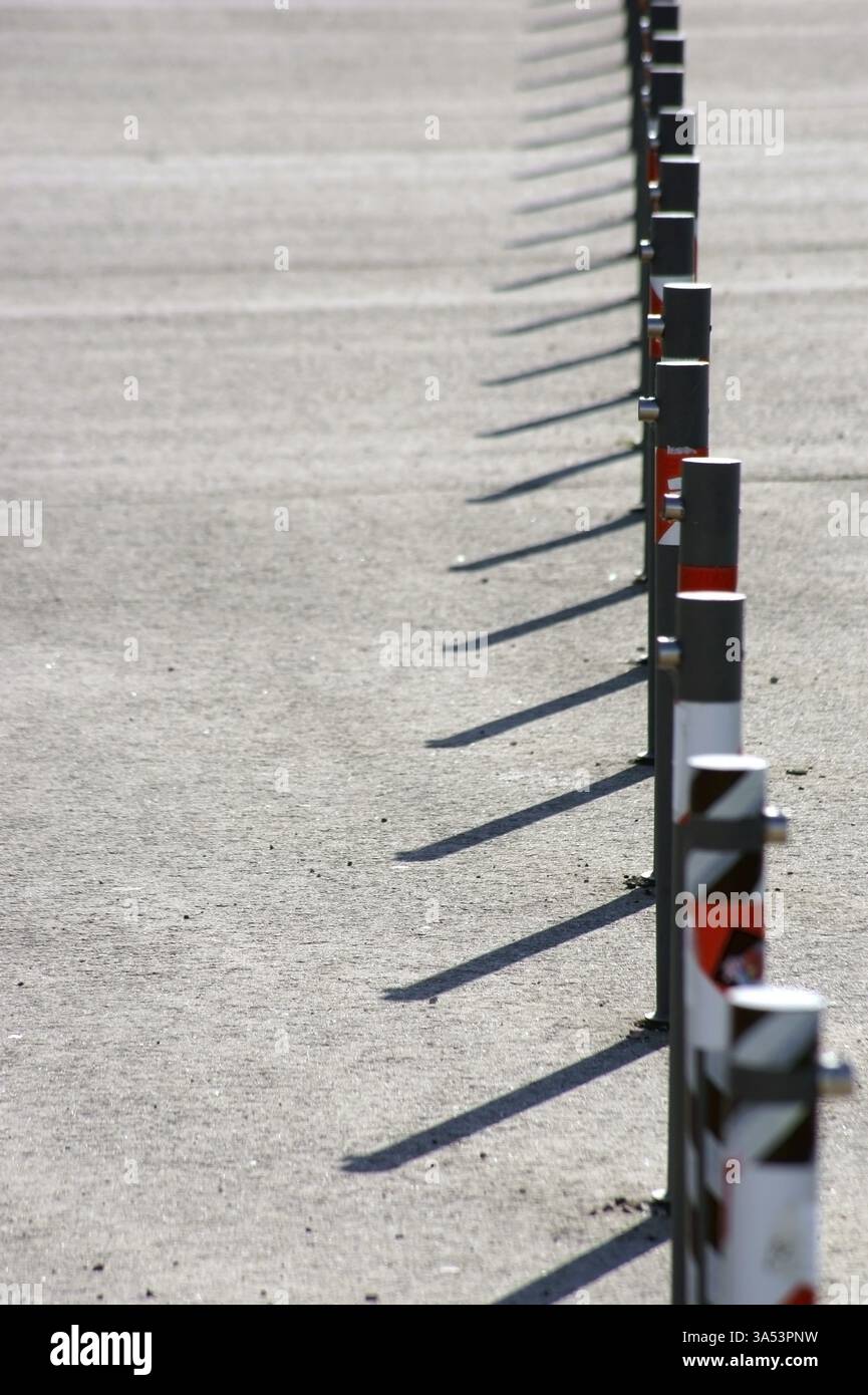 Pavement post with shade Stock Photo - Alamy