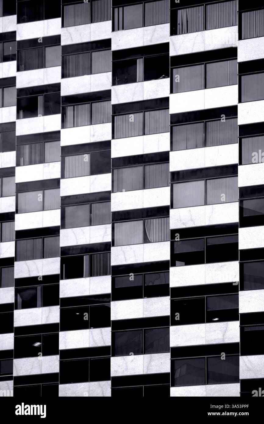 Interlocking windows on a modern residential building and tower block ...