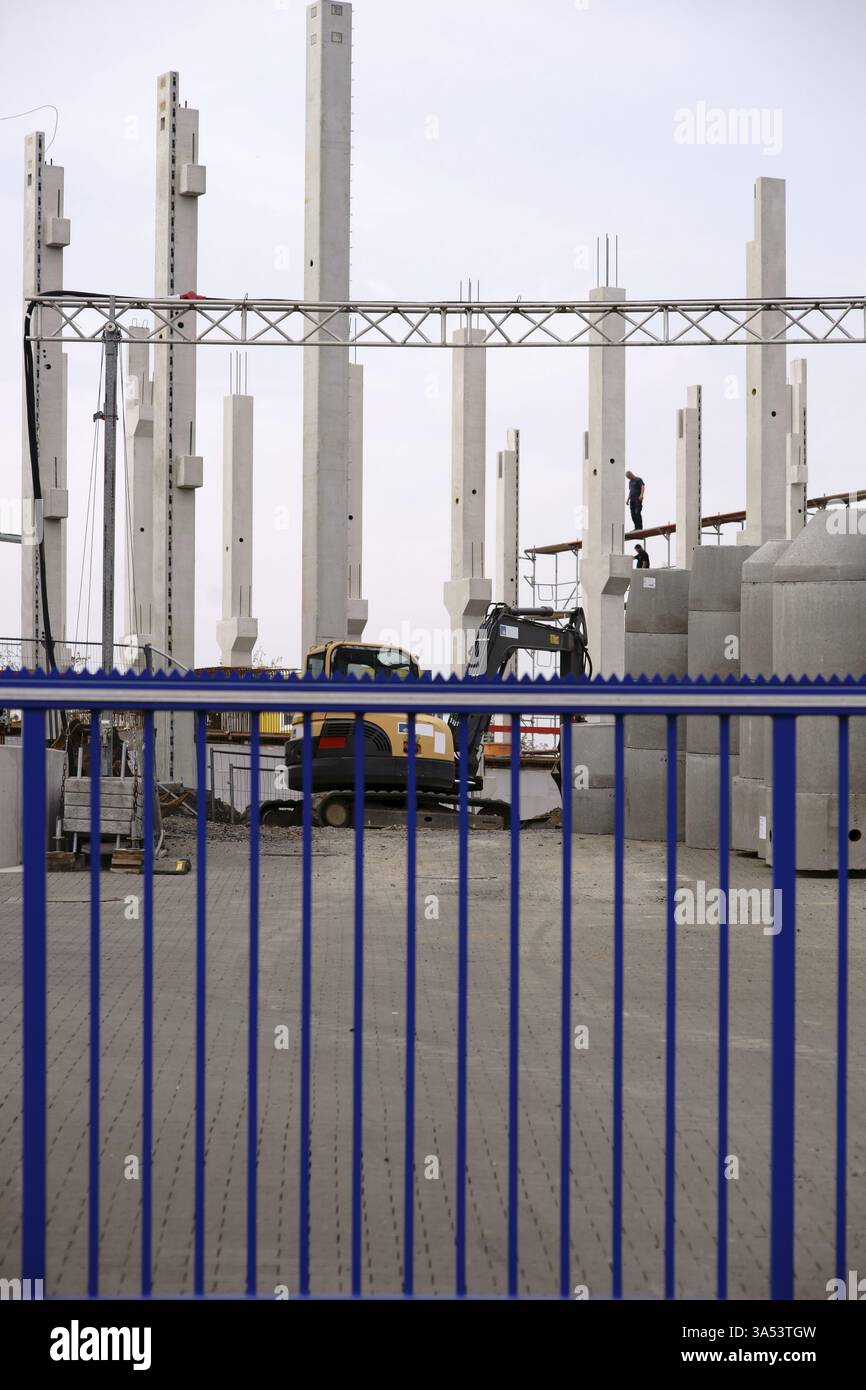 The new construction of a raw materials factory with the foundation of ...