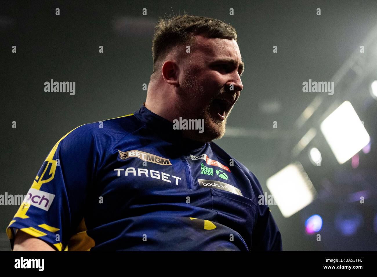 Luke Littler of England celebrates hitting a 9 Darter against Michael ...