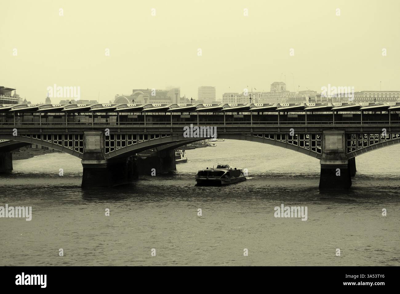 The Blackfriars Bridge over the River Thames in London with solar ...