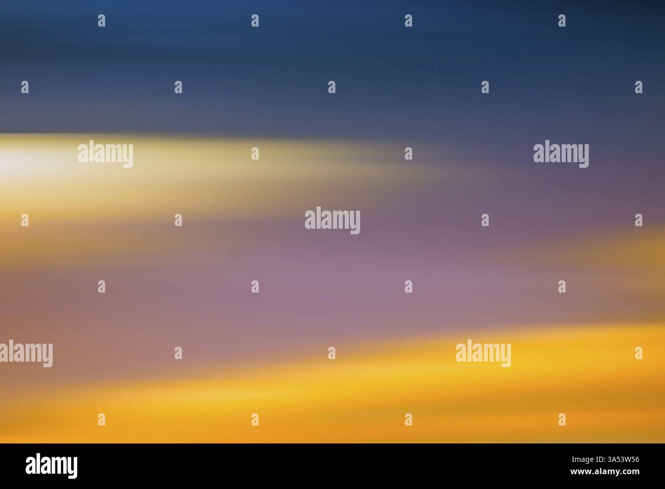 A blurred sky with multi-coloured and colourful clouds Stock Photo - Alamy