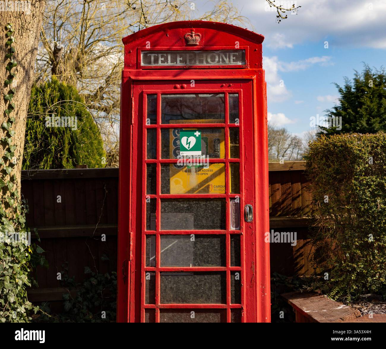 An Emergency Defibrillator in a village red telephone box, in Latimer ...