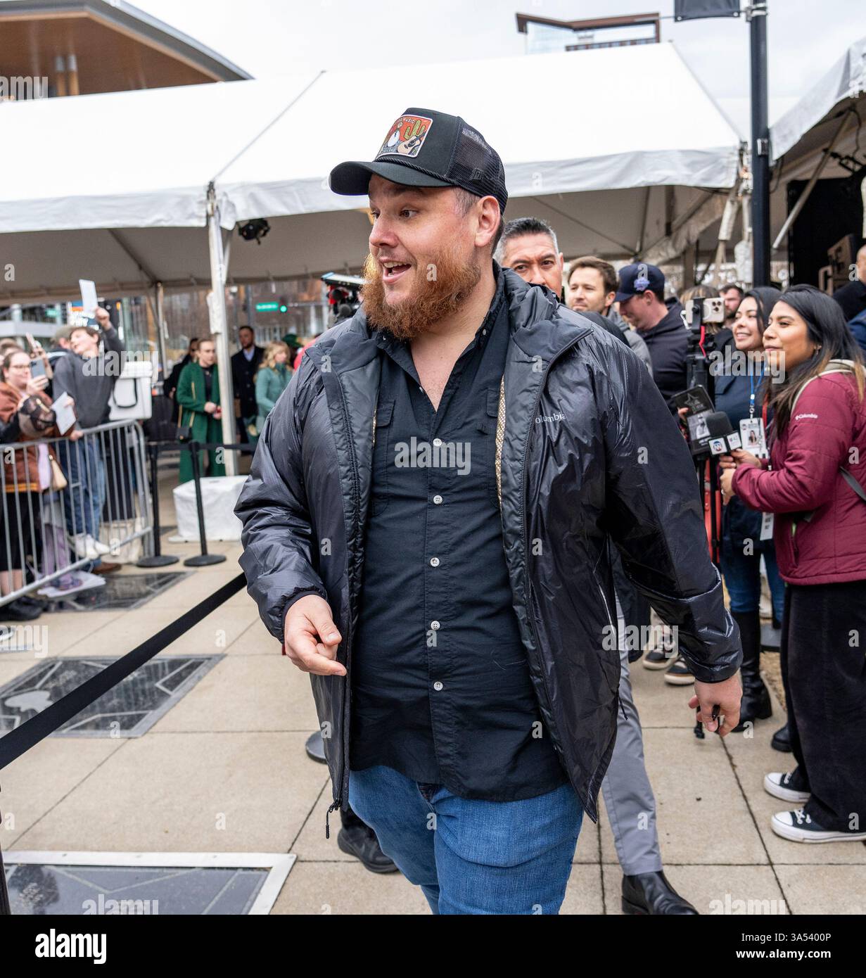 Luke Combs interacts with fans during the ceremony honoring Luke Combs ...