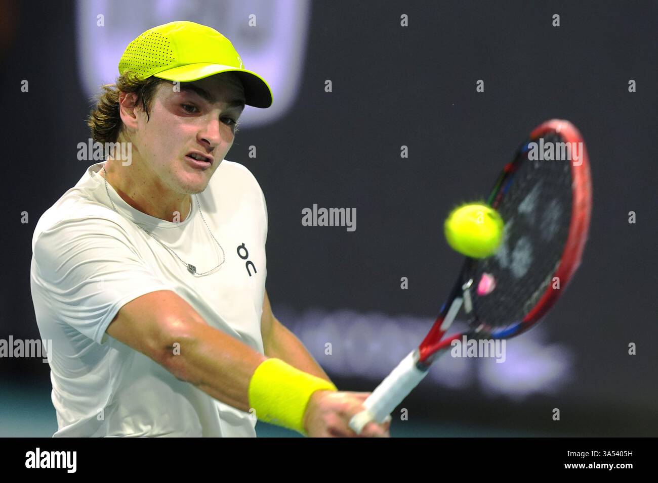 Joao Fonseca of Brazil hits a return to Learner Tien during the Miami ...