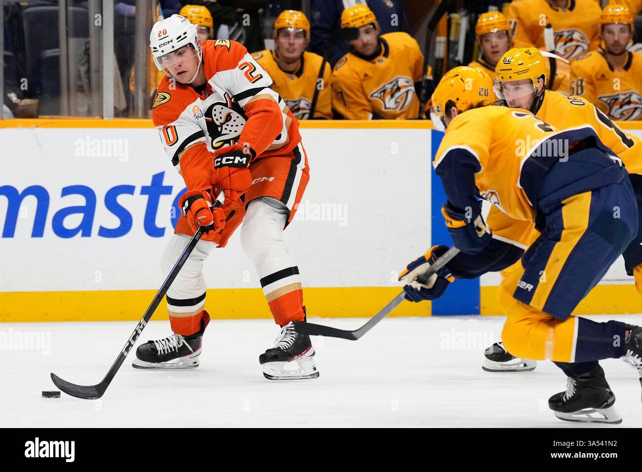 Anaheim Ducks right wing Brett Leason (20) passes the puck past ...