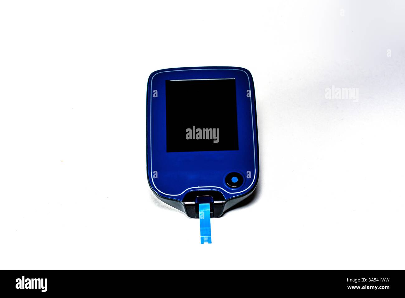 Portable glucose meter showing blank screen on white background for ...