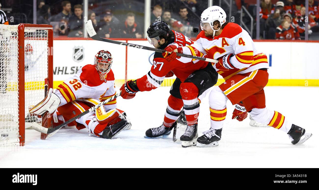 New Jersey Devils center Paul Cotter (47) scores a goal against Calgary ...