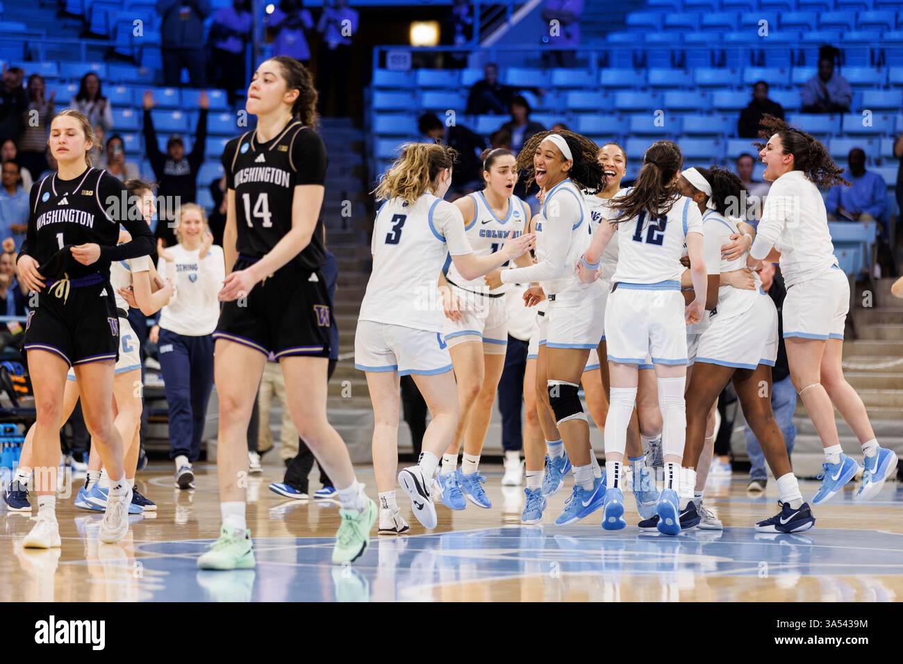 Columbia players, right, celebrate after defeating Washington in a ...