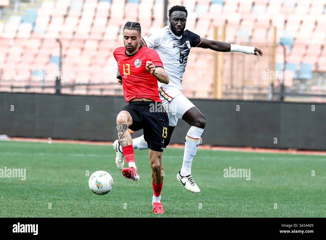 Cairo, Egypt. 20th Mar, 2025. Stanley Ratifo (front) of Mozambique ...