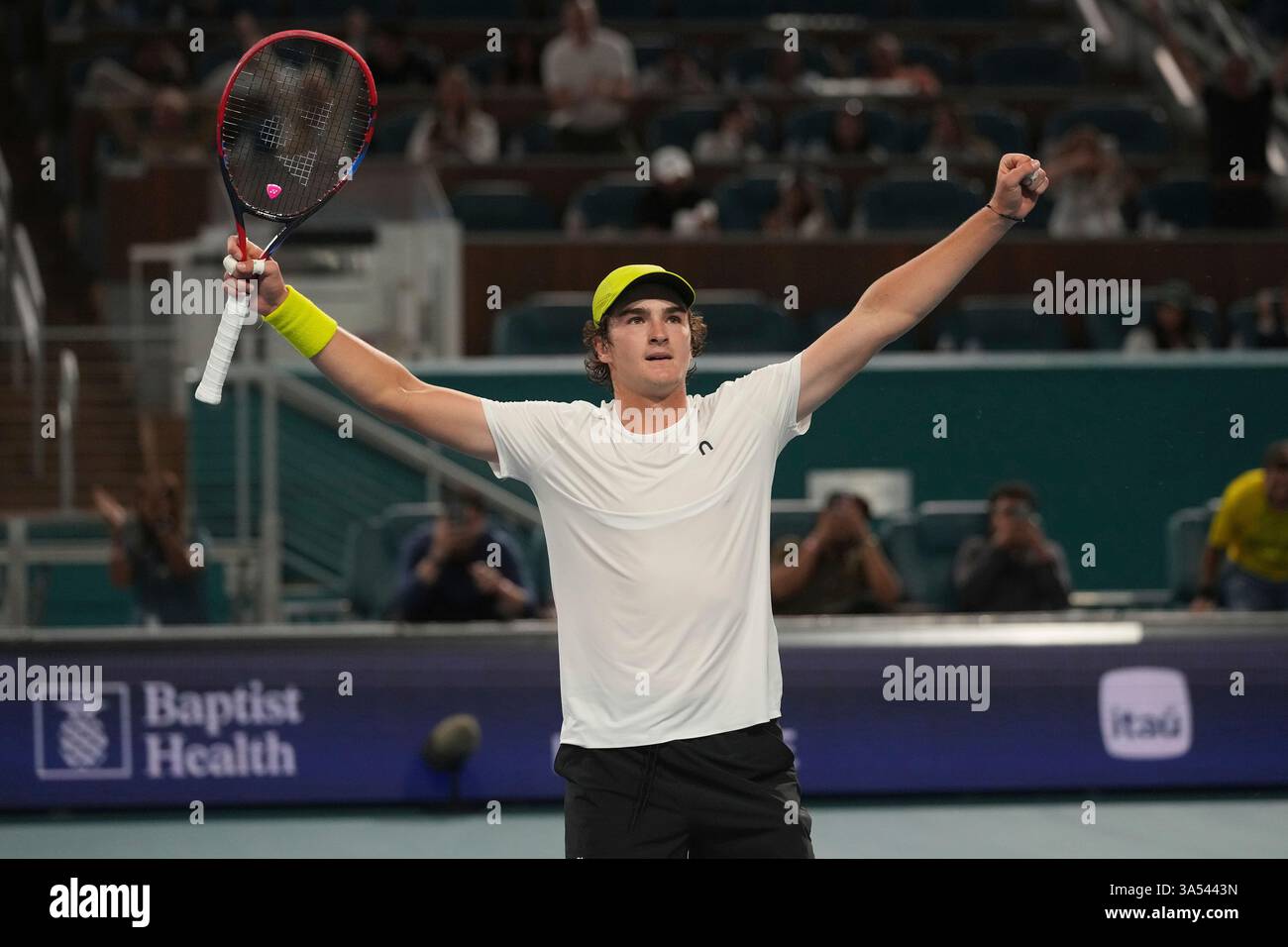 Joao Fonseca of Brazil reacts after defeating Learner Tien during the ...