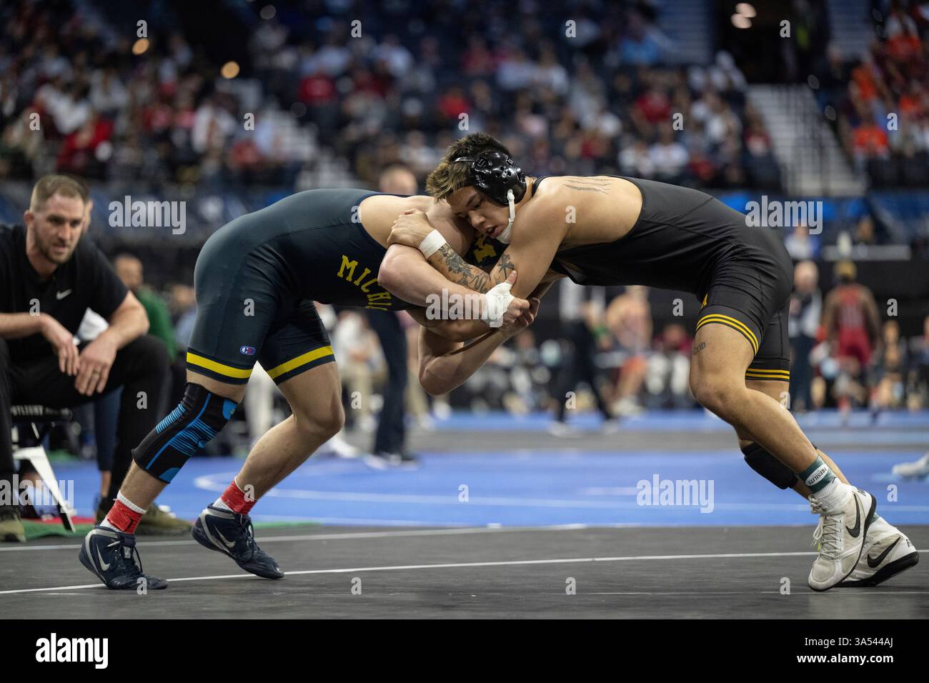 PHILADELPHIA, PA - MARCH 20: Kyle Parco of Iowa faces off against Dylan ...