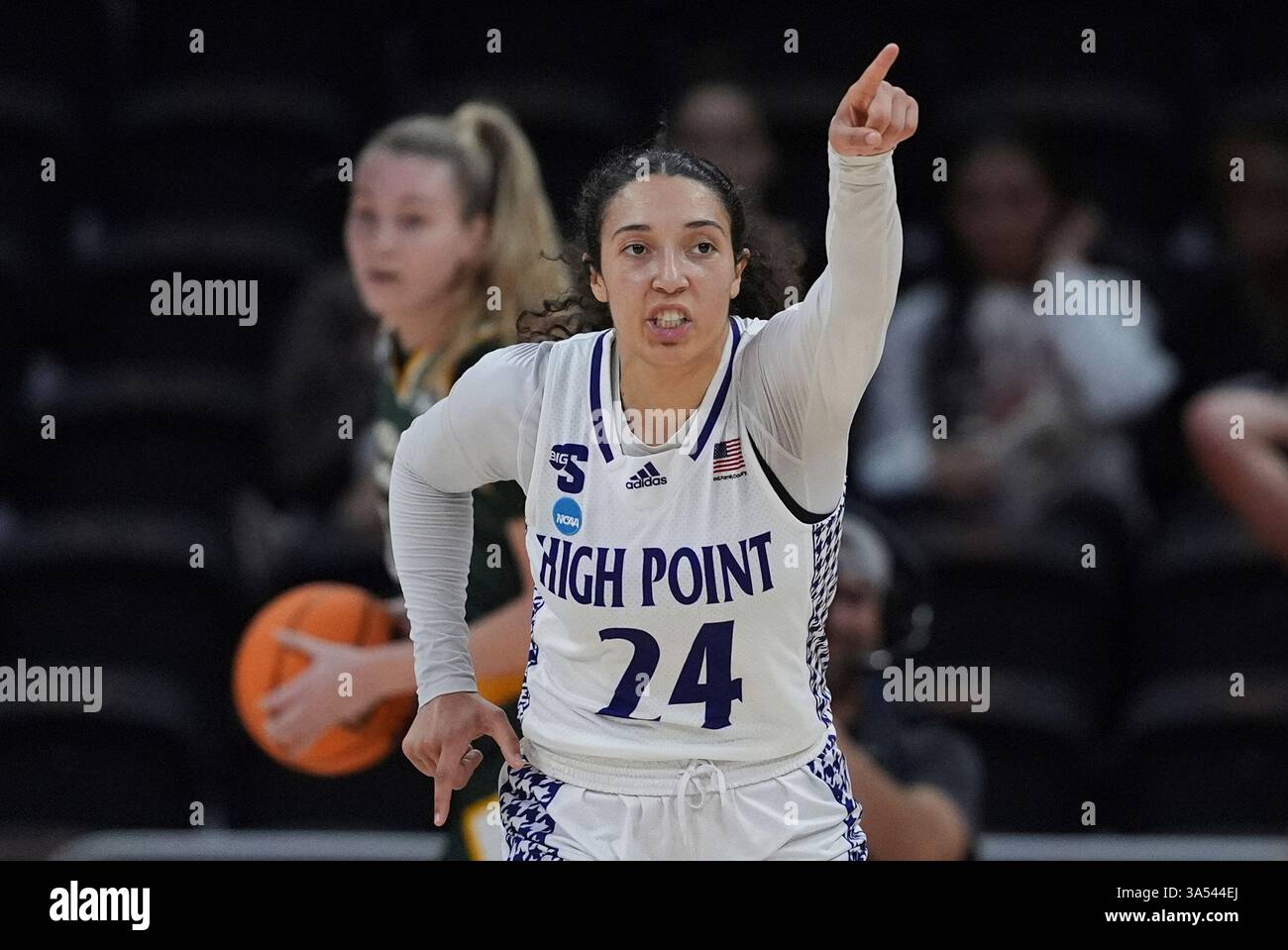 High Point guard Jaleesa Lawrence (24) reacts after scoring against ...