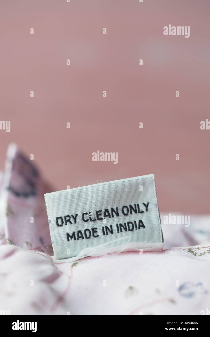 Label showing dry clean instructions on fabric made in India Stock ...