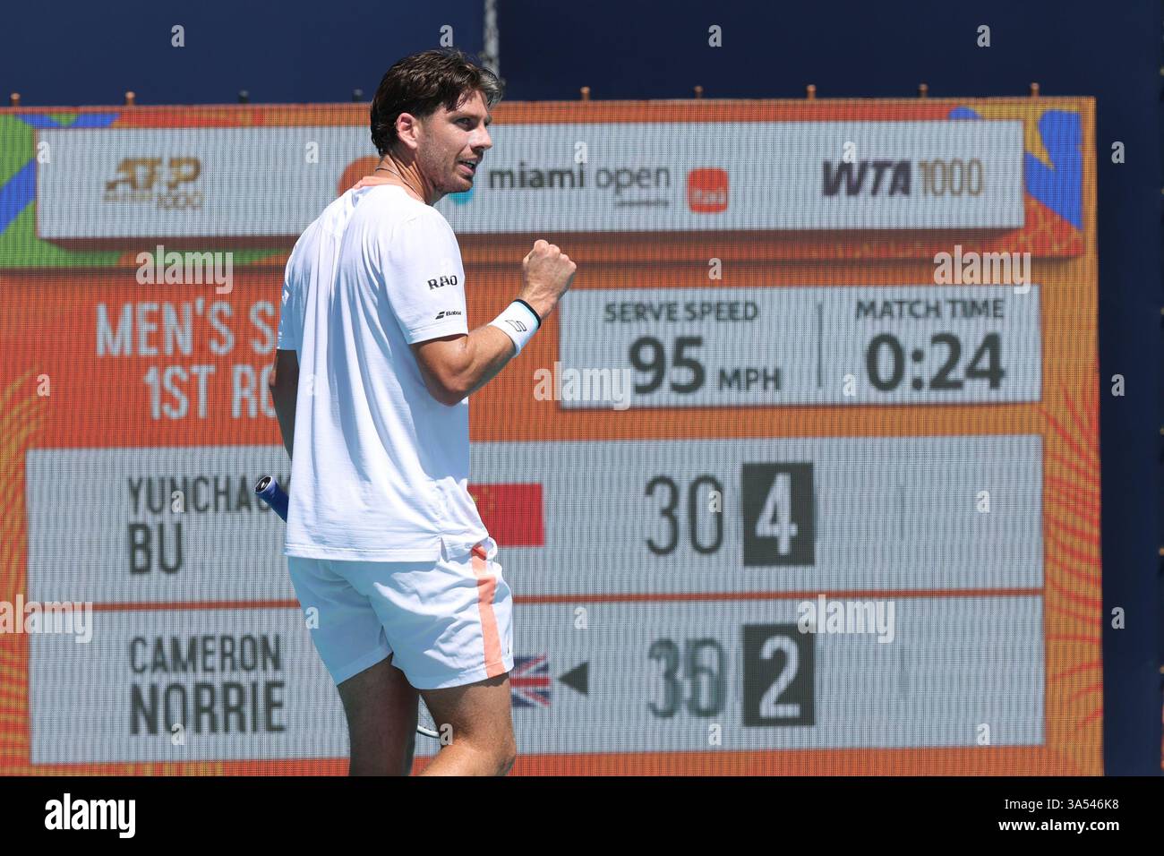 MIAMI GARDENS, FLORIDA - MARCH 20: Yunchaokete Bu of China defeats Cameron Norrie of Great ...