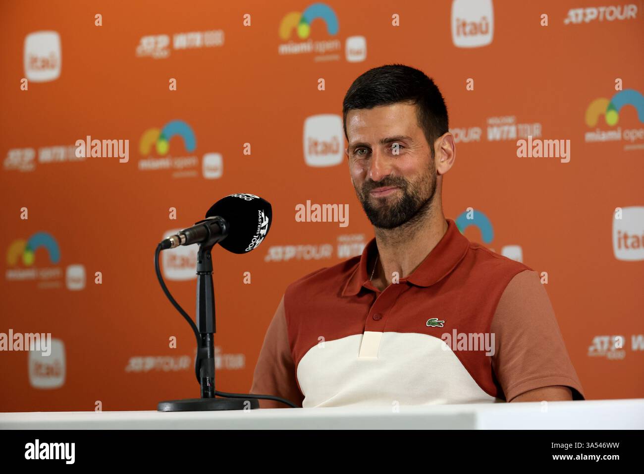 MIAMI GARDENS, FLORIDA - MARCH 20: Novak Djokovic (SRB) talks to the ...